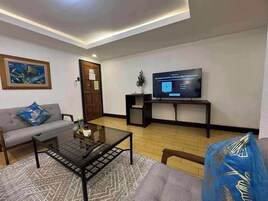 Suite-Estúdio Signature | Sala de estar | Televisor LED 