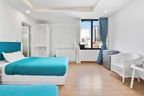 Quarto triplo | Frigobar, Wi-Fi de cortesia, roupa de cama