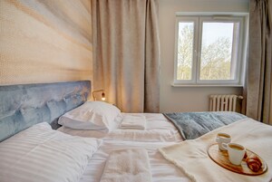 Apartamento família | 2 quartos, ferros/tábuas de passar roupa, Wi-Fi de cortesia