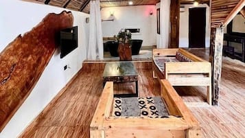 Cobertura presidencial, 1 quarto, piscina particular, vista para a praia | Área de estar