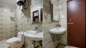 Quarto Deluxe | Casa de banho | Toalhas fornecidas