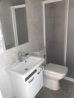 Apartamento | Casa de banho | Um secador de cabelo