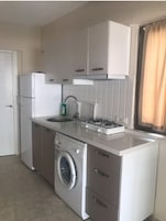 Apartamento | Cozinha privada | Uma chaleira elétrica