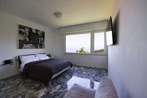 Suite Superior | Roupa de alta qualidade, camas de colchão viscoelástico, minibar 