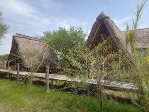 Cabana tradicional, vista para o jardim | Individualmente decorados, individualmente mobiliados, Wi-Fi de cortesia