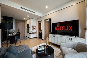 Apartamento Deluxe | Sala de estar