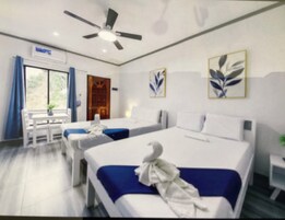 Quarto luxo, 1 quarto, vista parcial para o oceano | Roupas de cama premium