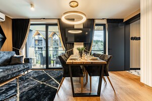 Apartamento família | Frigobar (abastecido com itens grátis), cofres nos quartos