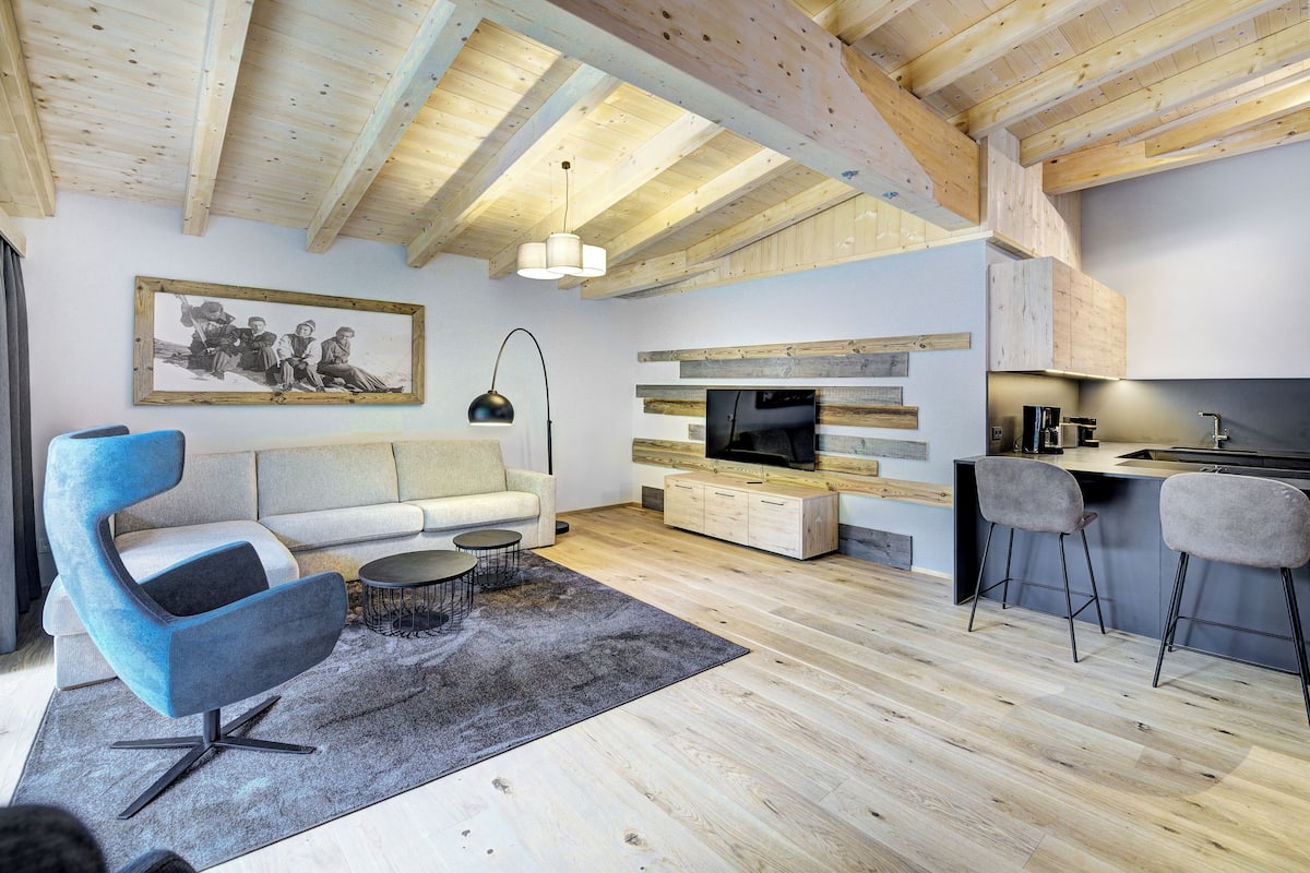 Apartamento conforto (Top 12) | Área de estar | TV de tela plana, pisos aquecidos