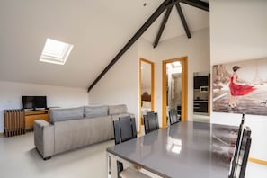 Apartamento Panorâmico | Sala de estar | TV de ecrã plano 