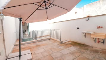 Apartamento, 1 quarto, fumadores, pátio | Terrenos do alojamento