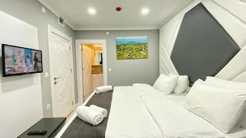 Quartos à prova de som, ferros/tábuas de passar roupa, Wi-Fi de cortesia