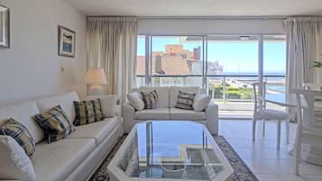 Apartamento | Sala de estar | Smart TV de 40 polegadas com canais por cabo
