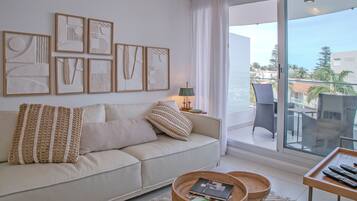 Apartamento | Sala de estar | TV de ecrã plano
