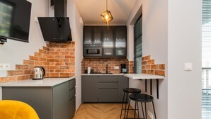 Apartamento conforto | Cozinha americana privada | Cafeteira/chaleira, chaleira elétrica