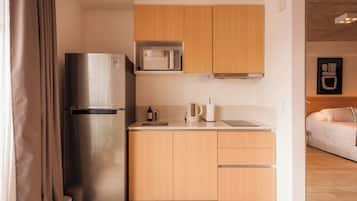 Apartamento Deluxe | Sala de estar | Smart TV