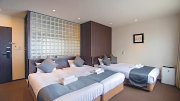 Quarto quádruplo urbano | Cortinas blackout, Wi-Fi de cortesia, roupa de cama