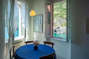 Apartamento, 1 quarto, cozinha | Área de estar