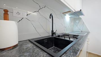 Quarto triplo superior | Banheiro | Secador de cabelo, bidê, toalhas de banho, papel higiênico