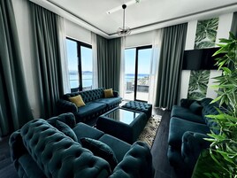 Apartamento Elite | Sala de estar | TV de ecrã plano 