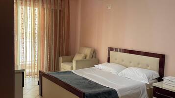 Apartamento, 3 quartos | Quartos à prova de som, Wi-Fi de cortesia, roupa de cama