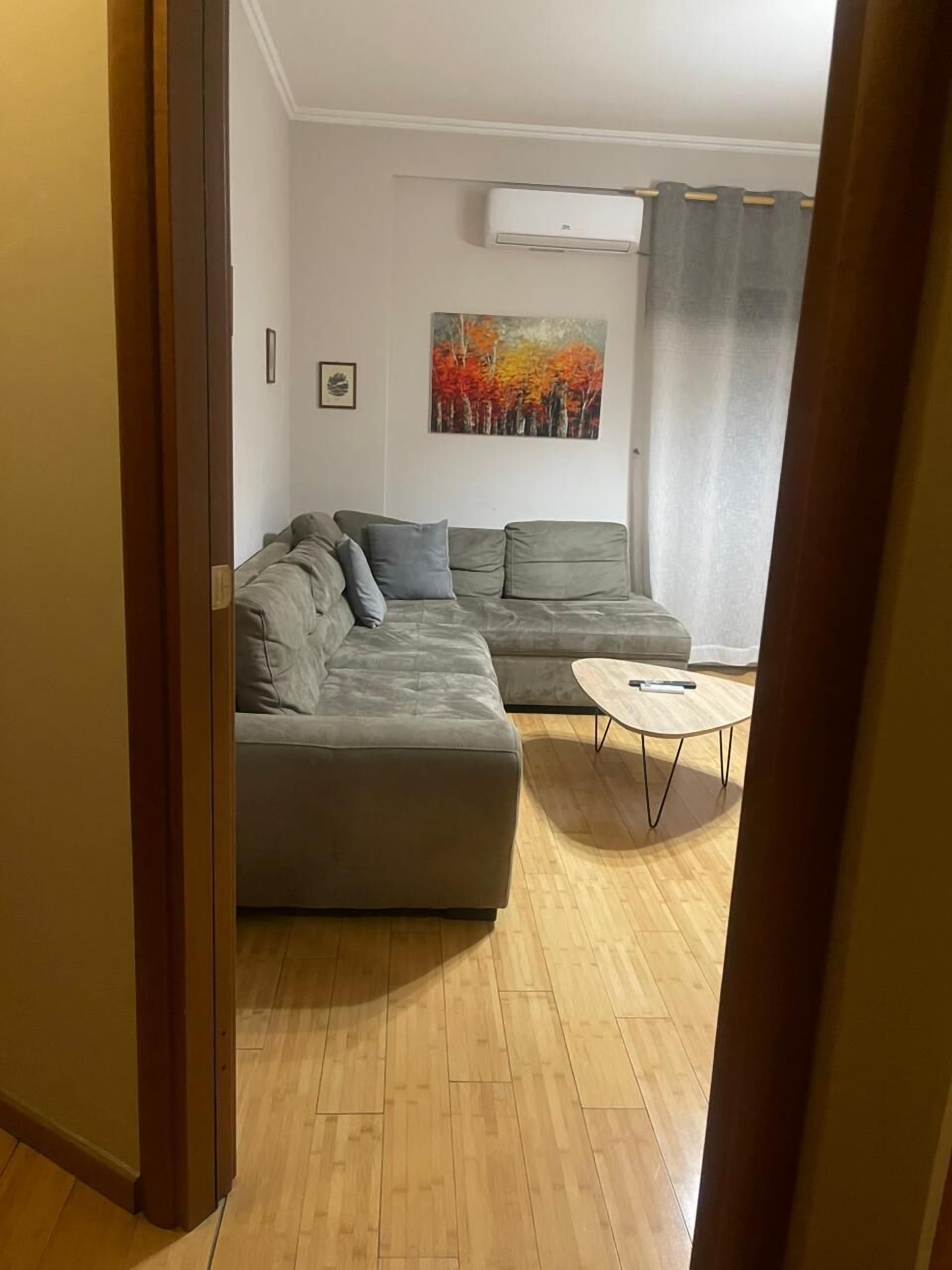 Apartamento, 1 quarto | Área de estar | TV de tela plana