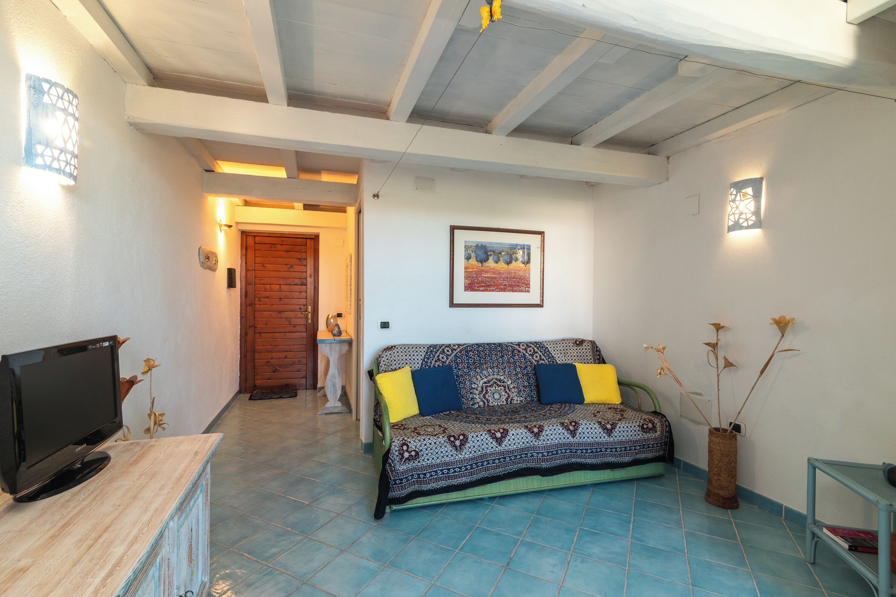 Apartamento Familiar, vários quartos (Bilo Porto Rotondo Castello 3) | Sala de estar | Televisor de ecrã plano de 21 polegadas com canais por cabo 