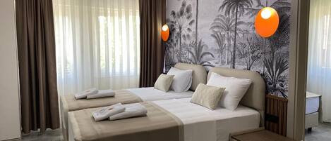 Suíte design, vista para o jardim | Roupas de cama premium, Wi-Fi de cortesia, roupa de cama