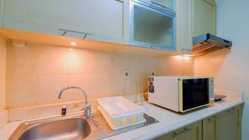 Apartamento | Cozinha privada | Um frigorífico/congelador grande, uma placa de cozinha