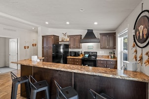 Casa | Cozinha privada | Um frigorífico/congelador grande, um micro-ondas, um forno