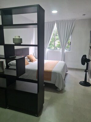 Suite | Camas de colchão viscoelástico, cofre no quarto