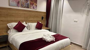 Roupas de cama premium, frigobar, individualmente decorados