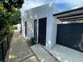 Suite Deluxe | Minibar, cofre no quarto, cortinas/cortinados opacos 