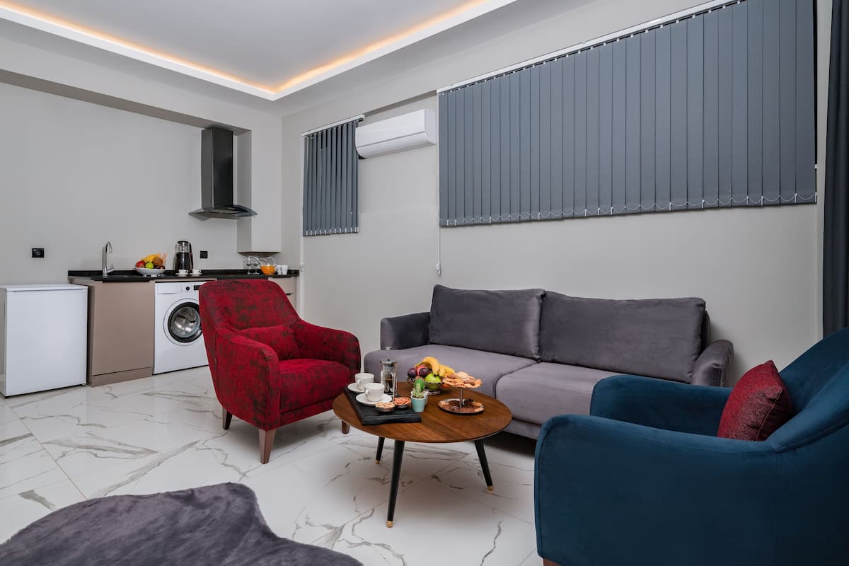 Suite Familiar | Sala de estar | Televisor LCD de 22 polegadas com canais via satélite
