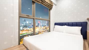 Apartamento Familiar, 3 quartos, Vista para a cidade, na torre | 1 quarto, roupa de alta qualidade, com decoração personalizada