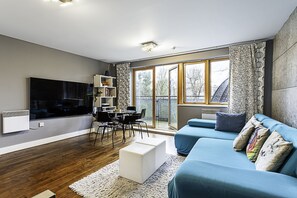 Apartamento Básico | Sala de estar | Televisor 