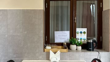 Apartamento conforto, vista para a montanha | Área de estar