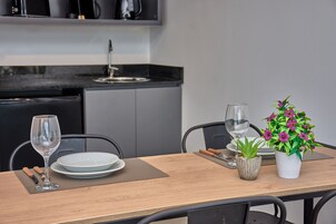 Apartamento superior | Sala de jantar