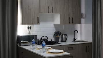Quarto Superior | Cozinha privada | Minifrigorífico, um micro-ondas, uma placa de cozinha