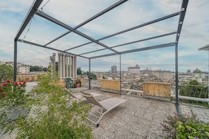 Apartamento superior | Terraço/pátio