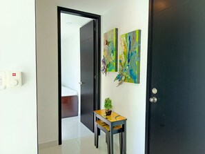 Apartamento standard, vista para a cidade | 1 quarto, Wi-Fi de cortesia, roupa de cama