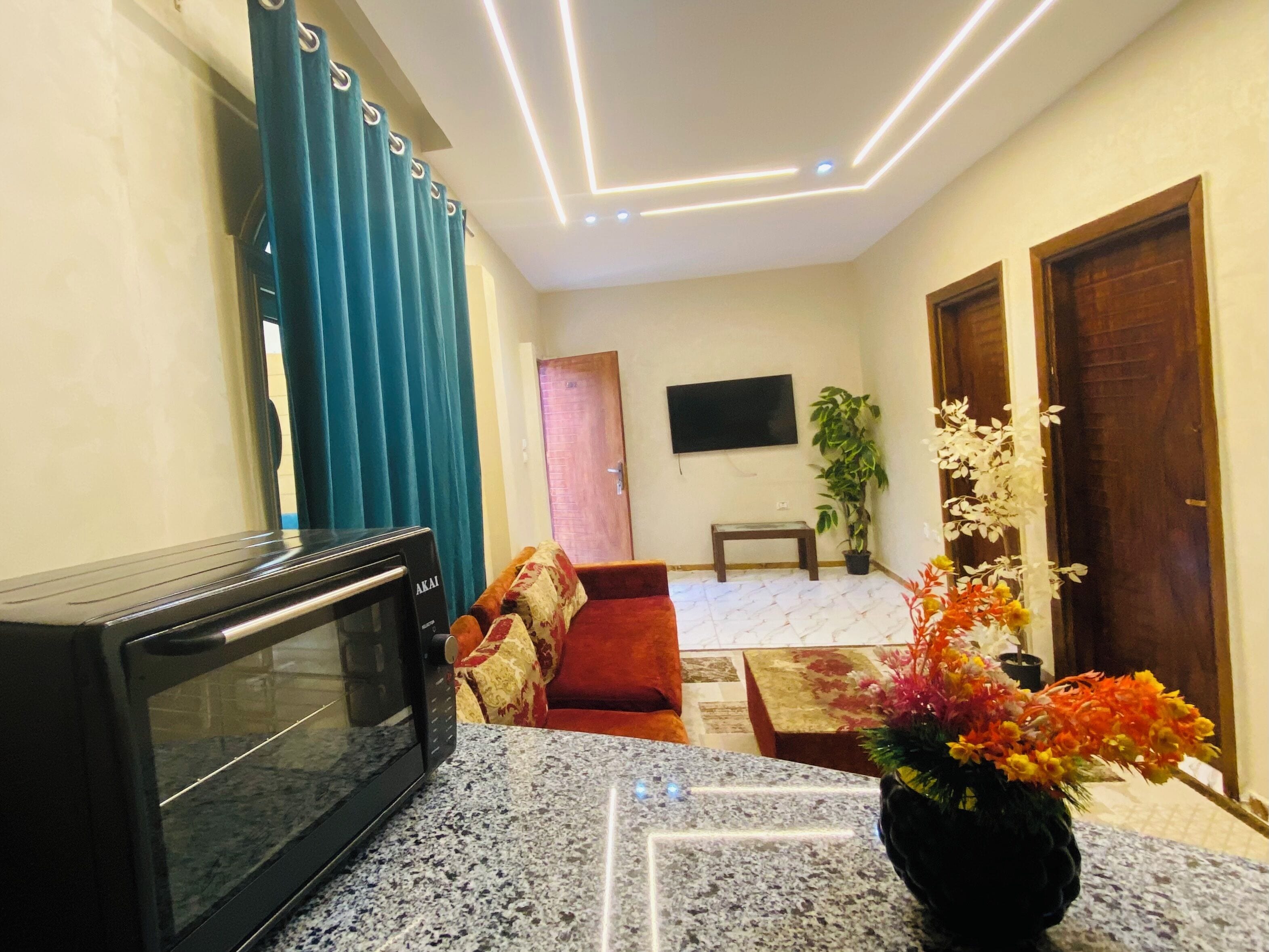 Suite Deluxe, 2 quartos, banheira de hidromassagem, vista para a montanha | Sala de estar