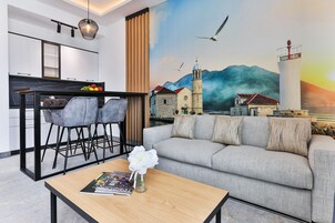 Suite Premium | Sala de estar | Televisor 