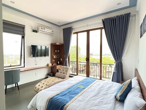 Quarto Duplo Deluxe para 1 Pessoa, Vista para a cidade | Roupa de alta qualidade, edredões de penas 