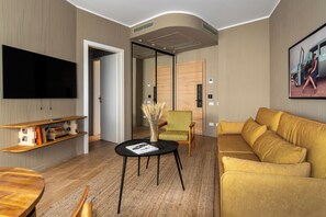 Apartamento, 1 quarto | Sala de estar | Televisor 