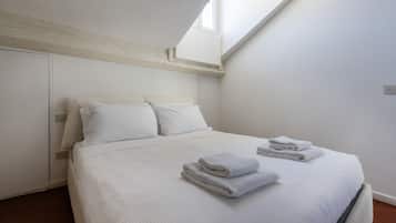 1 quarto, ferros/tábuas de passar roupa, berços (sobretaxa)