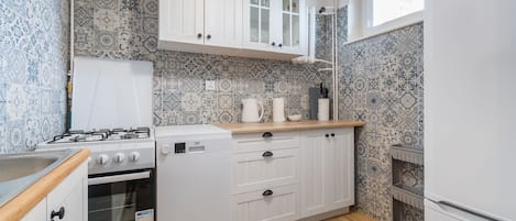 Apartamento clássico | Cozinha privada | Geladeira, fogão, cooktop, lava-louças