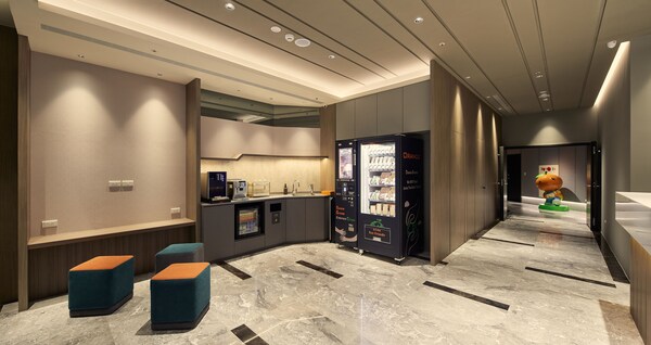 Orange Hotel Ximen Hanzhong - Wanhua District