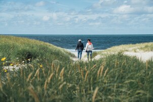 Na praia, praia de areia branca 