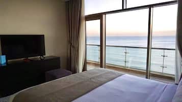 Suite Deluxe, não fumadores, vista para o mar | 1 quarto, cofre no quarto, ferro/tábua de engomar, Wi-fi grátis